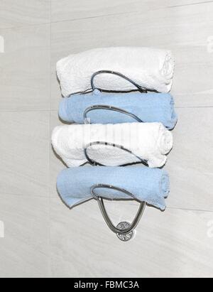 Rolled Towels in a Bathroom Interior Stock Photo - Alamy