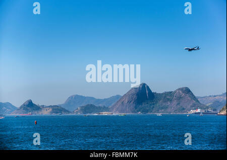 Airplane flying over the Guanabara Bay before landing. Rio de Janeiro ...