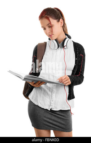 Happy young student reading notes in copybook and recording voice ...