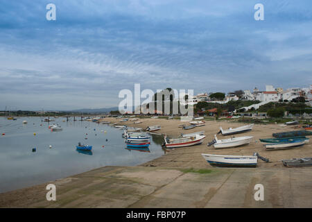 The Algarve, Alvor, fishing boats and yachts in the estuary at sunset ...