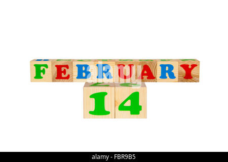 Wood cube with inscription 14 february and red hearts shape Stock Photo ...