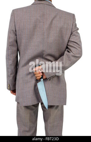 Man with the knife behind his back. Man holding sharp knife behind his ...