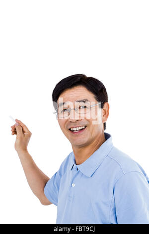 Elderly man pointing behind him Stock Photo - Alamy