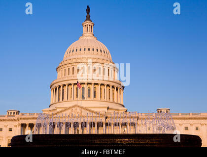 Rising sun illuminates the front of the Capitol building in DC Stock ...