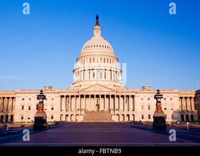 Rising sun illuminates the front of the Capitol building in DC Stock ...