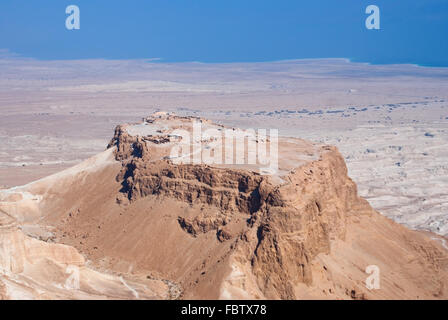 An aerial view of Masada with ancient fortress and rocky mountains in ...