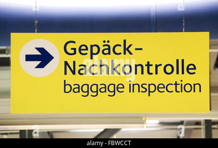 German sign with text baggage inspection at the customs Stock Photo - Alamy