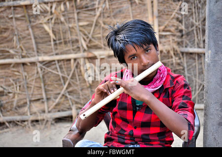 Flute playing boy Stock Photo - Alamy