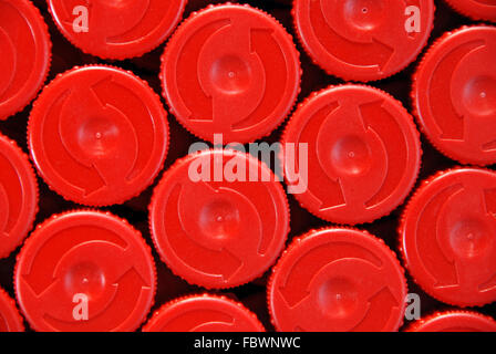 Collect plastic bottle caps. Close-up shot of stack of recyclable ...