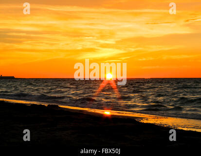 The Sun almost gone at a Yucatan Peninsula Beach Stock Photo - Alamy