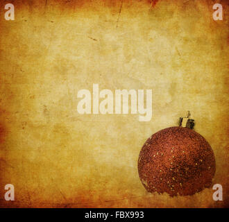 bauble over vintage paper, nice christmas background Stock Photo - Alamy