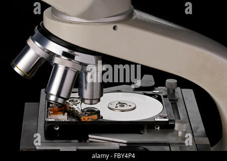 Hard disk drive under a microscope Stock Photo - Alamy
