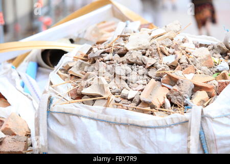 Full construction waste debris bags Stock Photo - Alamy