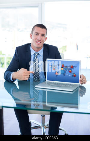 businessman with laptop pointing at the screen Stock Photo - Alamy