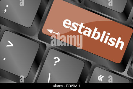 Computer keyboard key with establish word Stock Photo - Alamy