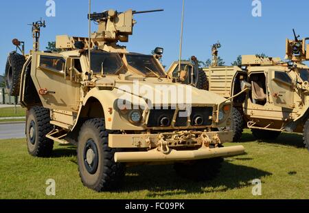 MRAP or mine resistant ambush protected vehicle fitted mine roller ...