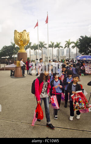 The Golden Bauhinia sculpture in the Golden Bauhinia Square, with HKCEC ...