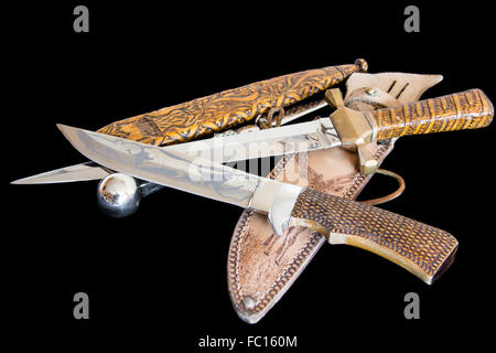 Cold weapon on black background Stock Photo - Alamy