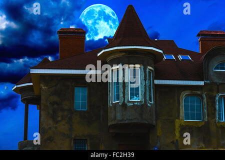 Haunted House Mansion With Moon And Clouds At Night Stock Photo - Alamy