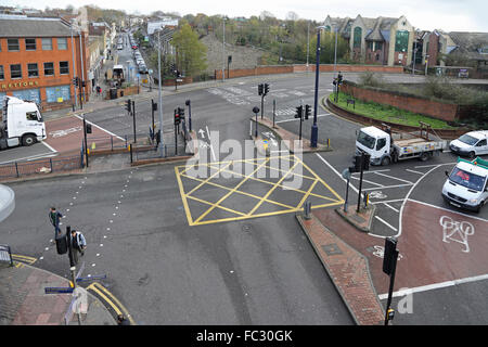 Aerial view of a roundabout with road markings at night. Elevated road ...