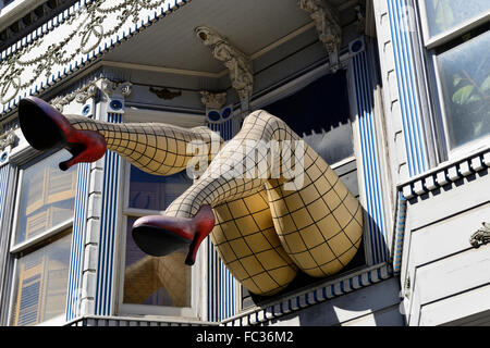 Giant legs leaning from window of gift store in Haight Ashbury district ...