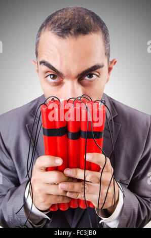 The businessman with dynamite isolated on white Stock Photo - Alamy