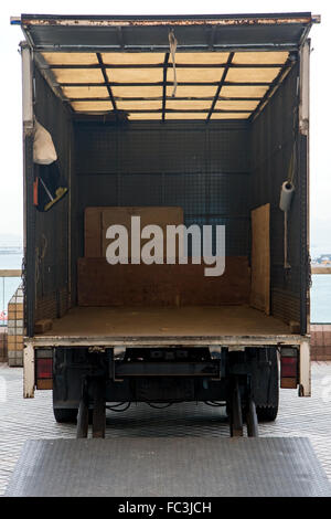 Empty truck and trailer with open back door Stock Photo - Alamy