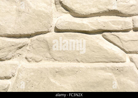 Elegant stone wall from small square parts. Rock texture Stock Photo ...