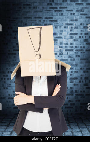 Composite image of businesswoman lifting box off head Stock Photo - Alamy