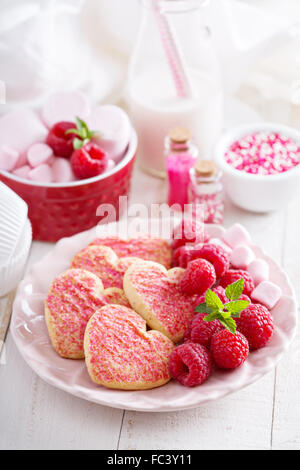 Heart shaped cookies with raspberries for Valentines day Stock Photo ...