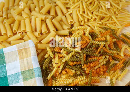 Many different types of pasta mixed together in one picture closeup ...