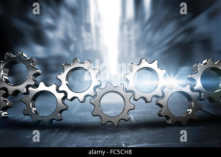 Composite image of metal cogs and wheels connecting Stock Photo - Alamy