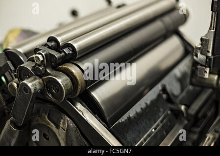 Old fashioned Press printing machine closeup indoors Stock Photo - Alamy