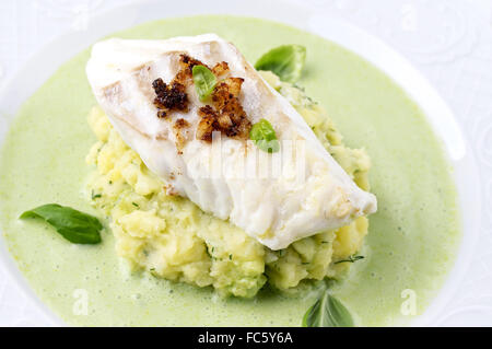 Cod filet in Basil Champagne Foam Stock Photo - Alamy