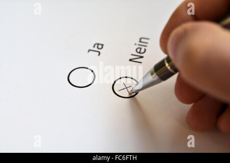 Vote on yes or no on a ballot Stock Photo - Alamy