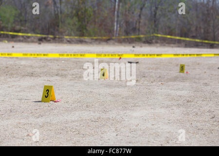 yellow evidence number tag in car bomb crime scene Stock Photo - Alamy
