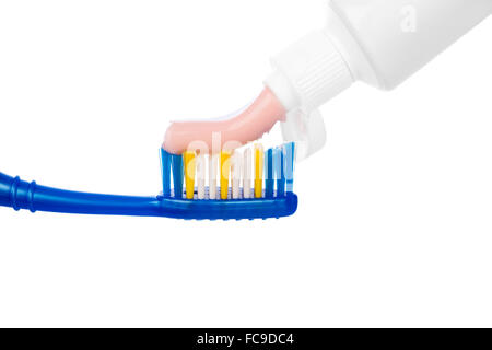 Plastic toothbrush with paste on white background Stock Photo - Alamy