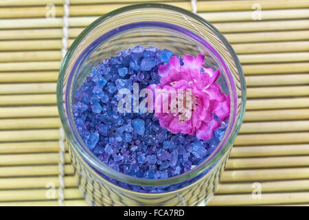 Spa treatment setting with purple theme Stock Photo - Alamy
