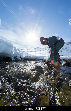 A man fills up a bottle with water †as temperatures rise in Krakow ...