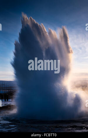 Geyser spouting water Stock Photo - Alamy