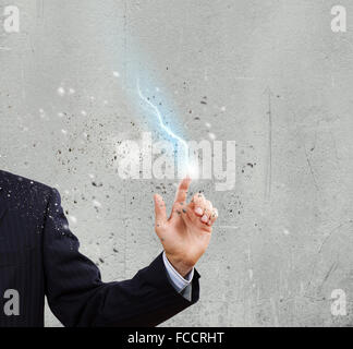 Hand with a lightning bolt Stock Photo - Alamy
