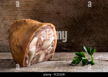 Traditional Romanian food - Pork aspic on wooden table Stock Photo - Alamy