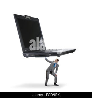 Two young businessman lifting huge laptop above head Stock Photo - Alamy