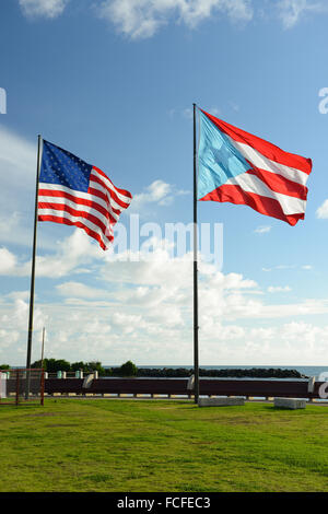 USA, Puerto Rico and Arroyo flags waving at the boardwalk. Arroyo ...