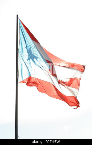 Puertorican flag waving against bright sky. Arroyo, Puerto Rico ...