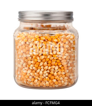 Uncooked Popcorn in a Glass Canister with a Metal Clamp. The image is a ...