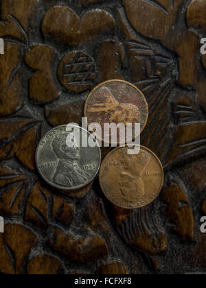 Three old American pennies side by side from the years 1943, 1940, 1936 ...