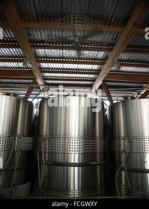 Stainless steel vats on industrial wine cellar Stock Photo - Alamy