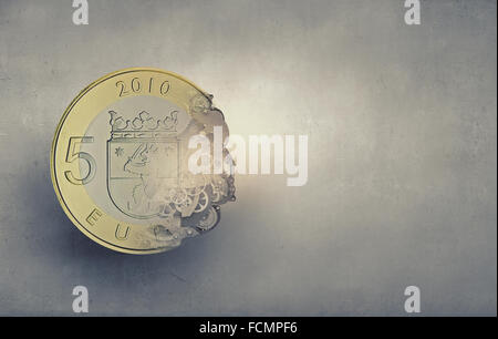 Euro 5 coin and cogwheels on digital background Stock Photo - Alamy