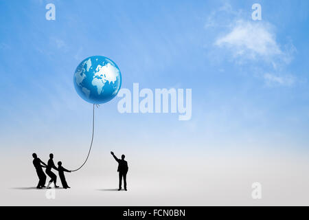 Silhouettes of people pulling Earth plane with rope Stock Photo - Alamy
